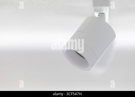 White wall light illuminating interior. modern trendy minimal ligthing ...