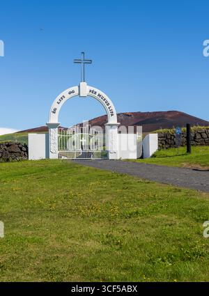 The Landa church cemetery gates in Heimaey island were on the edge of ...