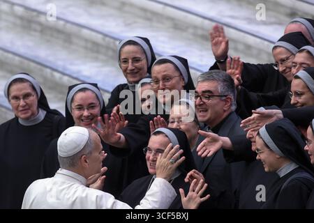 Pope Leo XIV greets the nuns during his weekly general audience in the ...
