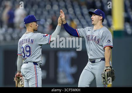 Texas Rangers left fielder Cody Freeman can't catch the fly allowing a ...