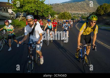 Many bicycle riders climbing the first large hill of the 2005 Honolulu ...
