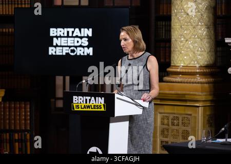 Britain's Reform UK party leader Nigel Farage waves during the Reform ...