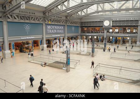 People walk in Moynihan Train Hall in Manhattan, New York City Stock ...