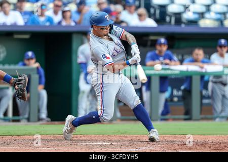 Texas Rangers third baseman Cody Freeman talks with teammates before a ...