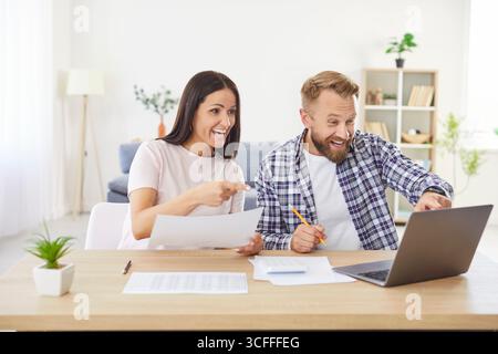 COUPLE DOING PAPERWORK Stock Photo - Alamy