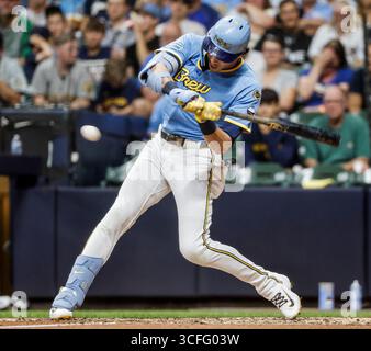 Milwaukee Brewers designated hitter Christian Yelich runs to second ...