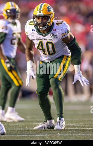 Edmonton Elks' Robbie Smith (40) looks to intercept a pass from ...