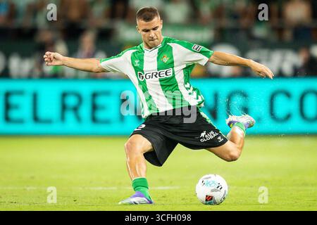 Pablo GARCIA of Real Betis Balompie and Jose Angel CARMONA of Sevilla ...