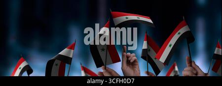 Syria flag in hand. Patriotic background. National flag of Syria ...