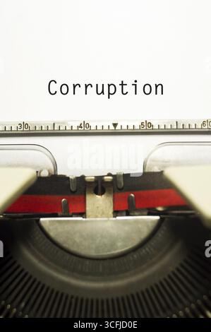 Corruption concepts, with message on typewriter paper Stock Photo - Alamy