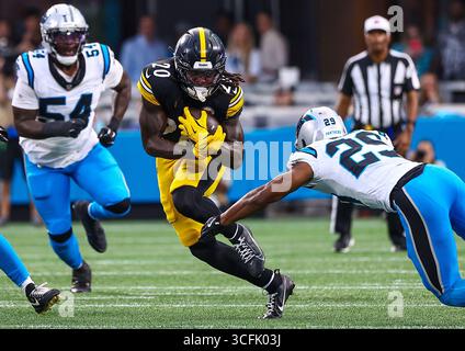 Carolina Panthers cornerback Akayleb Evans (29) goes to the locker room ...