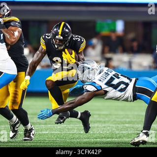 Carolina Panthers linebacker Bam Martin-Scott (57) signals during an ...
