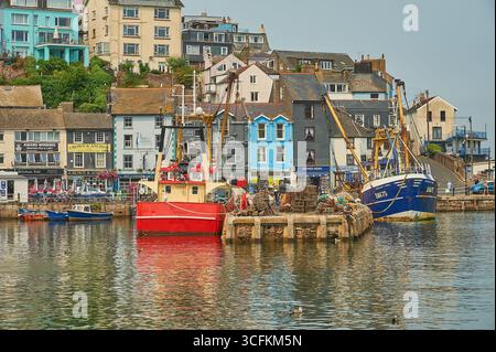 Fishing boats of all shapes and sizes in the harbour at Brixham, Devon ...