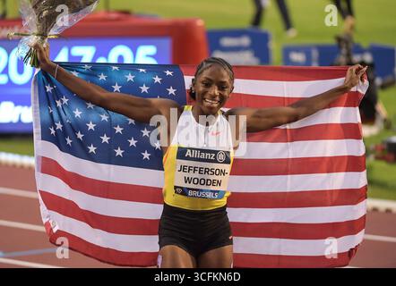 Melissa Jefferson-Wooden of USA celebrates after winning gold in the ...
