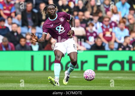 Lesley Ugochukwu of Burnley passes the ball forward during the Emirates ...