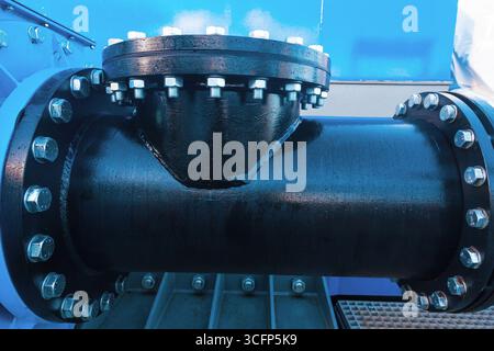 Large pipe connection with a large number of bolts and nuts enclosed on ...