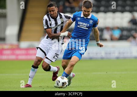 St Mirren's Keanu Baccus (left) has an attempt at goal during the ...