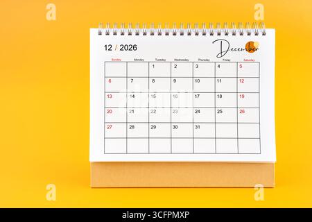 December 2026, Monthly desk calendar for 2026 year on yellow and blue ...