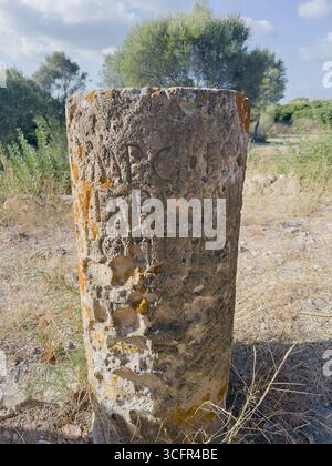 Archaeological Roman milestone marker carved with Latin letters ...