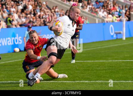 New Zealand's Jorja Miller scores a try during the Women's Rugby World ...