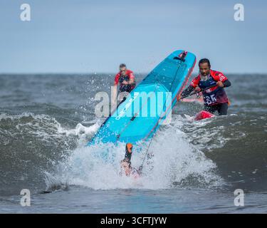 Stand Up Paddleboarding (SUP) racers in action at the Big Dippa 2025 ...