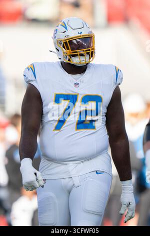 Los Angeles Chargers offensive tackle Austin Deculus (74) guard Mekhi ...