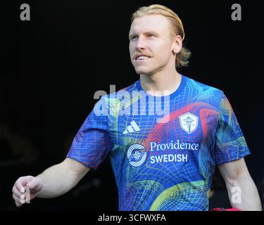 Seattle Sounders FC goalkeeper Andrew Thomas (26) lifts the Leagues Cup ...