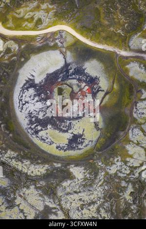 An aerial view of of volcano crater surrounded by rocks Stock Photo - Alamy