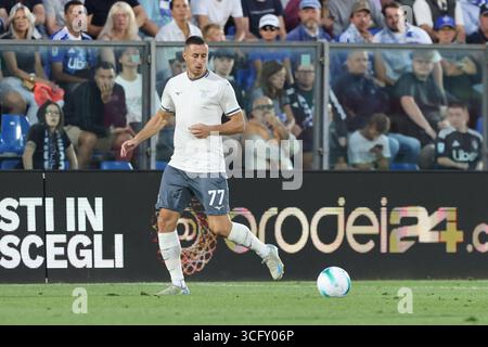 Adam Marusic of S.S. Lazio and Antonio Sanabria of U.S. Cremonese are ...