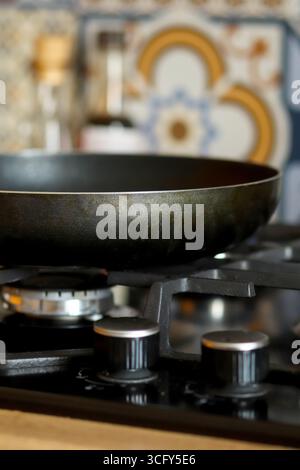 A vertical shot of a stove in the kitchen Stock Photo - Alamy