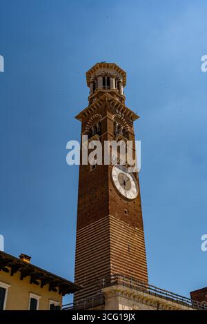 The Torre dei Lamberti is a clock tower in Verona, Italy Stock Photo ...