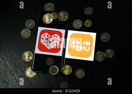 SHANGHAI, CHINA - AUGUST 26, 2025 - The logo of PDD and various coins ...