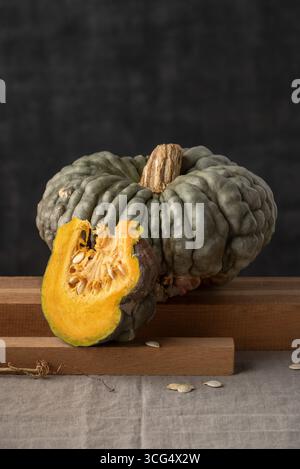 Heirloom Marina Di Chioggia Pumpkin With Knobby Skin Resting On Wooden ...