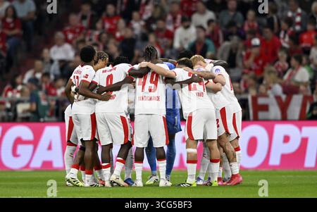 Team circle of RB Leipzig. LEIPZIG, GERMANY - JANUARY 14: Bundesliga ...