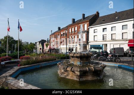 The Square Astrid with a fountain, a memorial to the world war victims ...