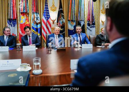 Interior Secretary Doug Burgum, center, tours the Lincoln Memorial ...