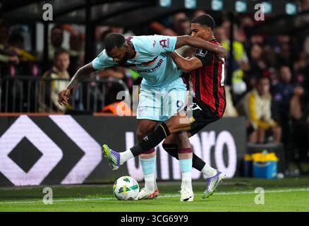 Brentford's Igor Thiago (left) and Bournemouth's Lewis Cook battle for ...