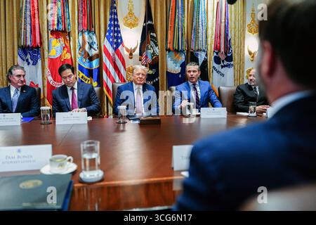 Interior Secretary Doug Burgum, center, tours the Lincoln Memorial ...