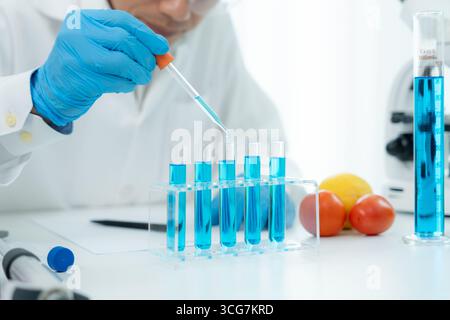 Scientist analyze biochemical samples in advanced scientific laboratory ...