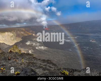 rainbow over the caldera Stock Photo - Alamy