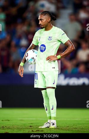 in action during the La Liga game between Real Sociedad and FC ...