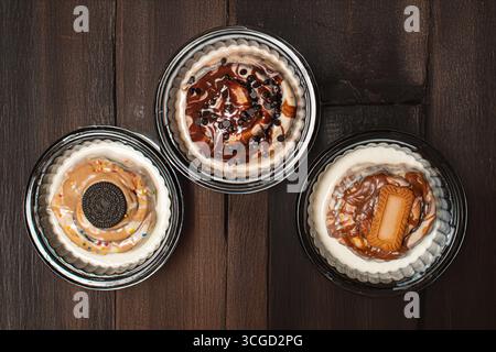 Containers with delicious food for delivery on grunge background with ...