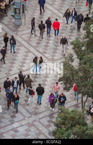 High-angle view of visitors walking in the outdoor courtyard of Technik ...