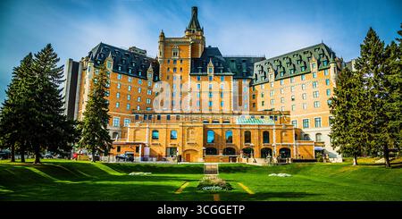 The lush gardens of the Bessborough Hotel in full bloom, framed by the ...