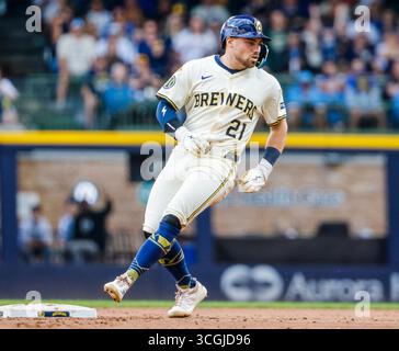 Milwaukee Brewers third baseman Caleb Durbin, right, high-fives ...