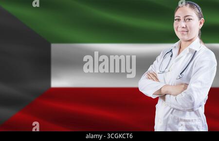 Doctor with crossed arms on Kuwait flag. Kuwait health and care concept ...