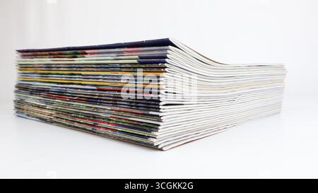 Back of covers with stacked sheets of paper and front view for copy ...