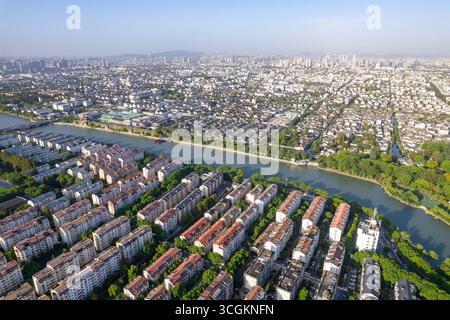 View of the Hangzhou Skyline with trees and buildings in the distance ...