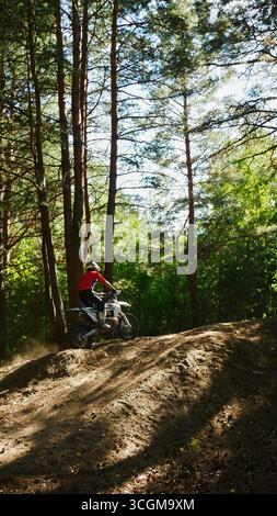 A man rides his bike through a forest in Wehrheim near Frankfurt ...