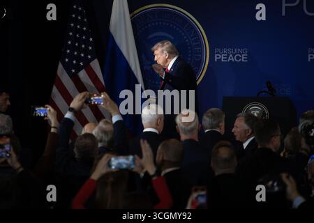 President Donald Trump walks off after an event to proclaim "Angel ...